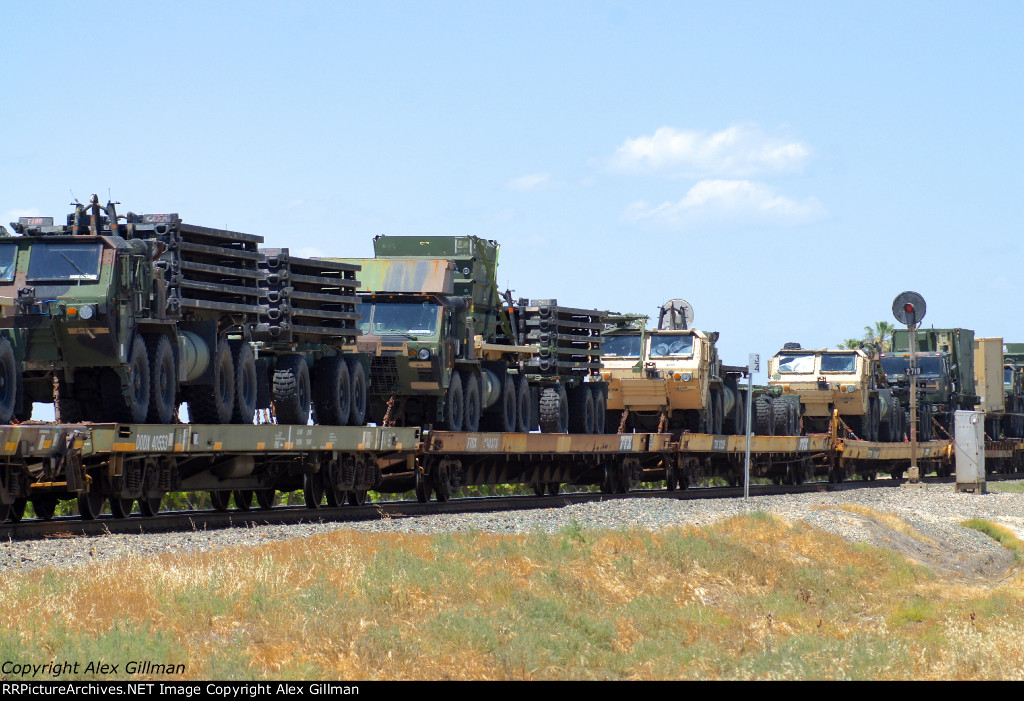 Military Equip. Past The Searchlights